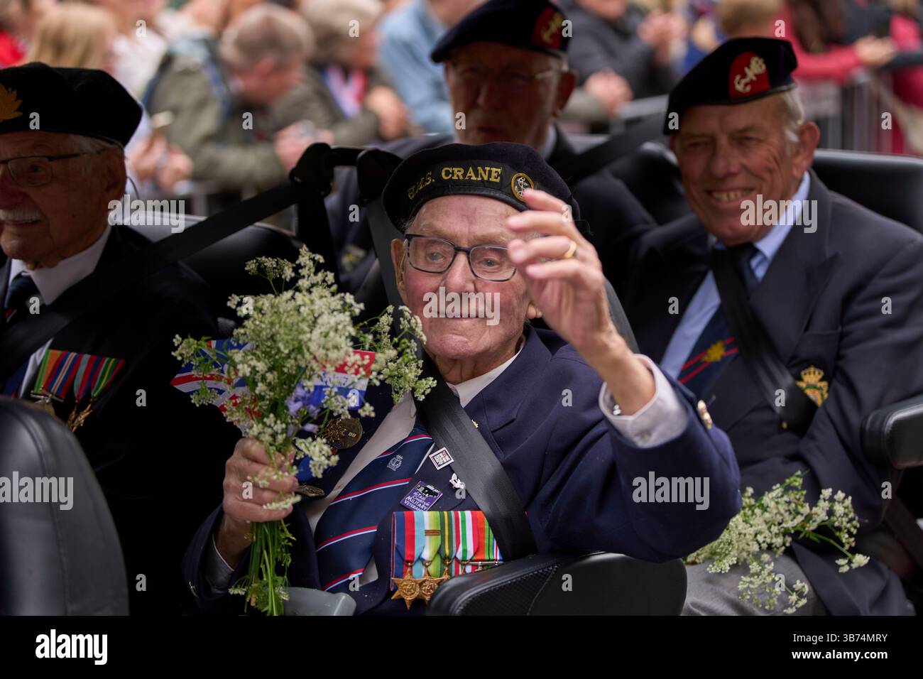 Canadian World War II veterans take part in a Liberation Day parade in ...