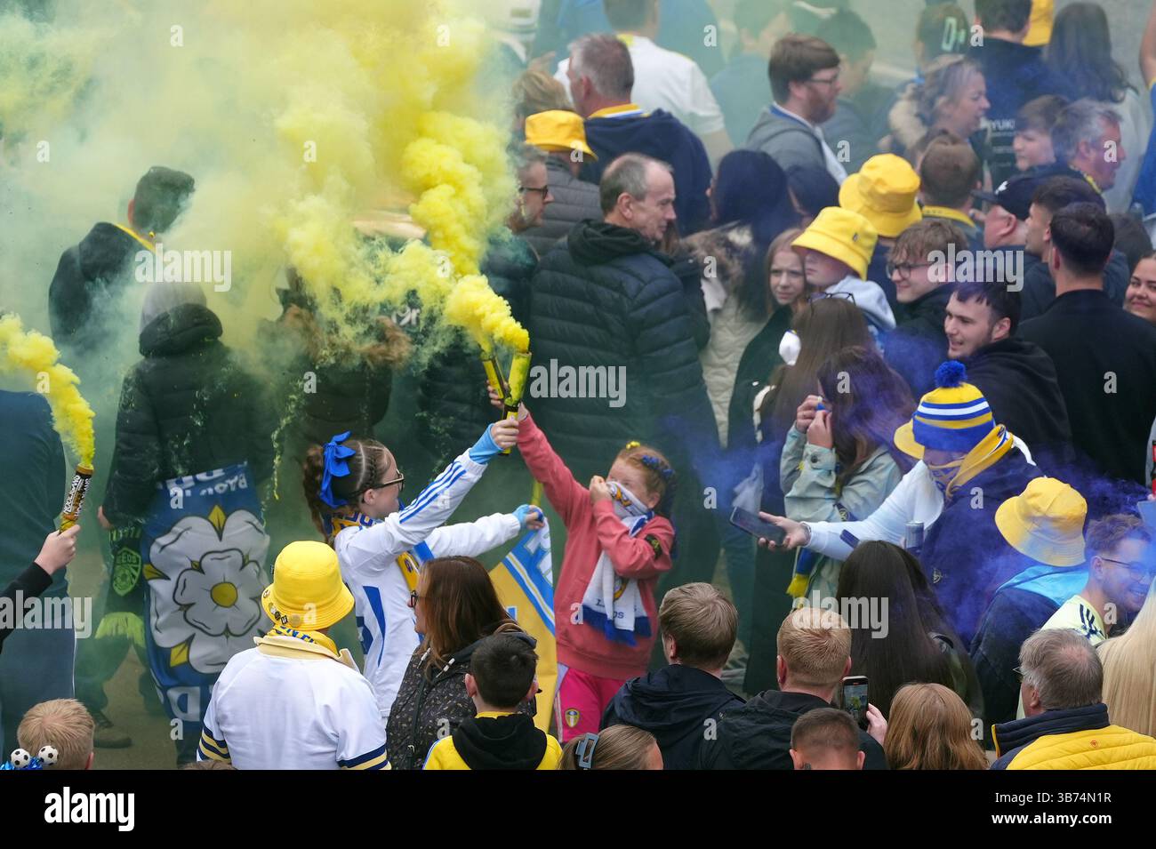 Leeds United fans lining the parade route in the city centre before the ...