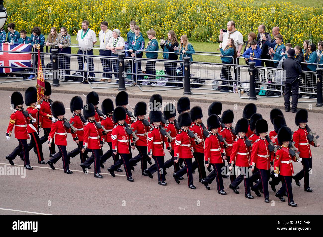 Bands of the Irish Guards march during a military procession for the ...