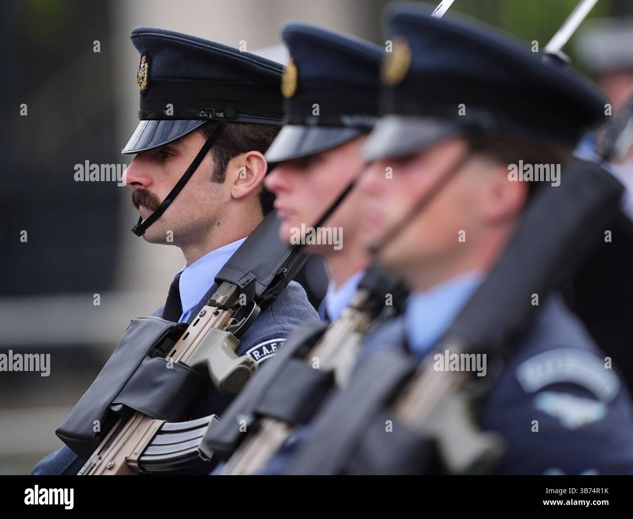 Members of the RAF Regiment march during a military procession marking ...