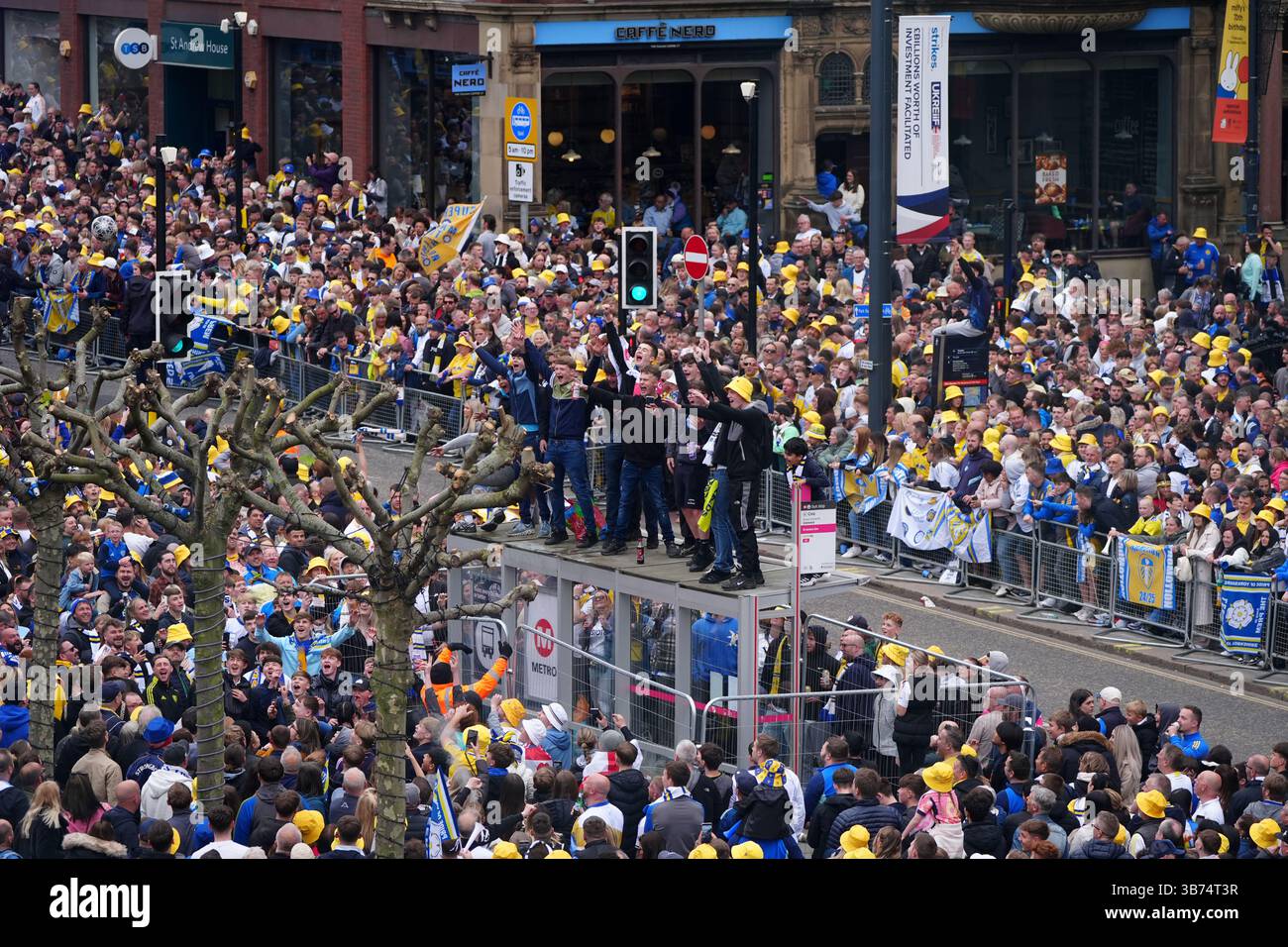 Leeds United fans lining the parade route in the city centre before the ...