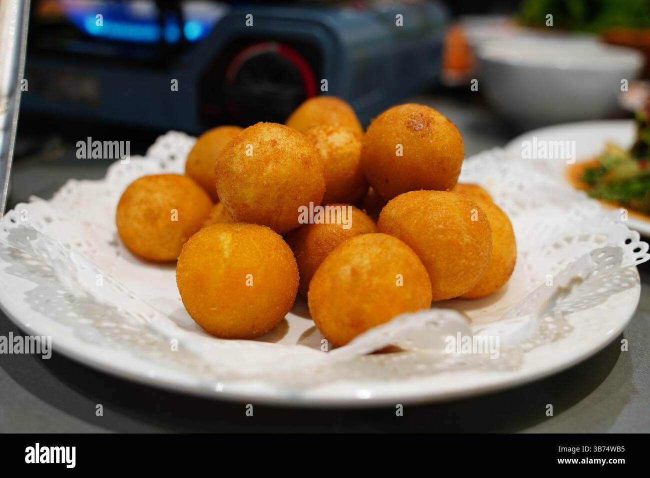 Round, crispy fried balls that you see in Chinese restaurants Stock ...