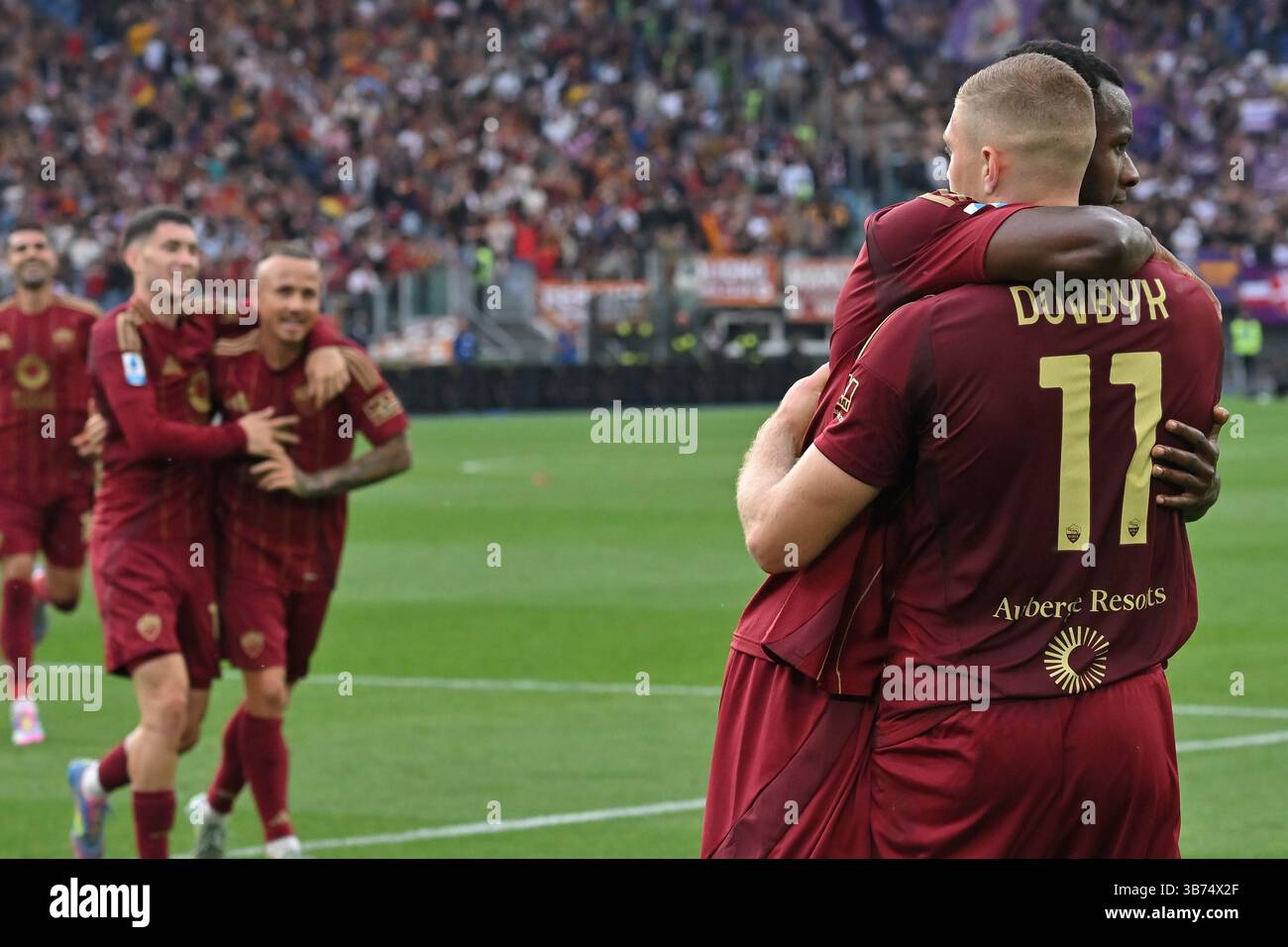 Artem Dovbyk of AS Roma celebrates a goal with teammates during the ...