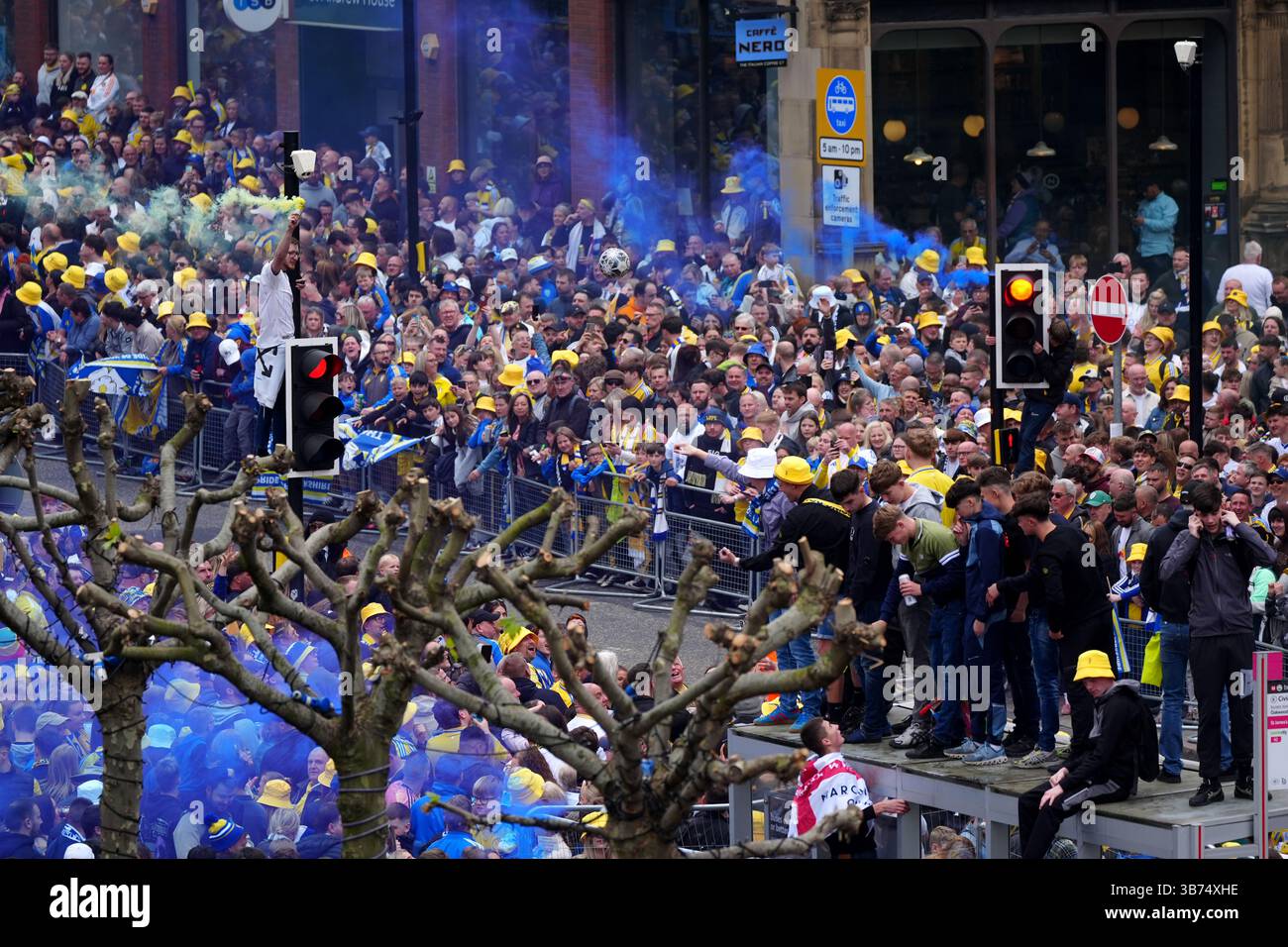 Leeds United fans lining the parade route in the city centre before the ...