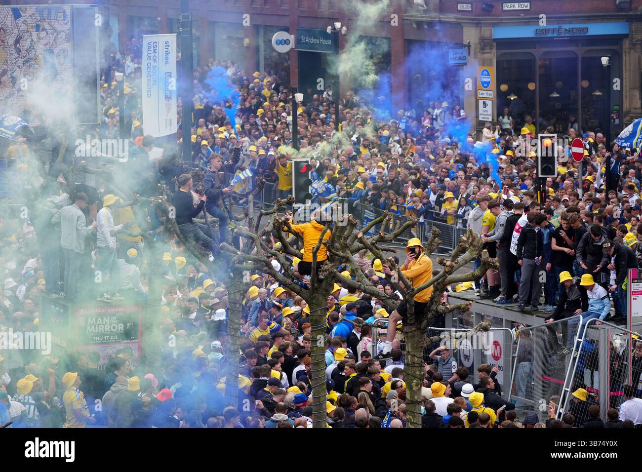 Leeds United fans lining the parade route in the city centre before the ...