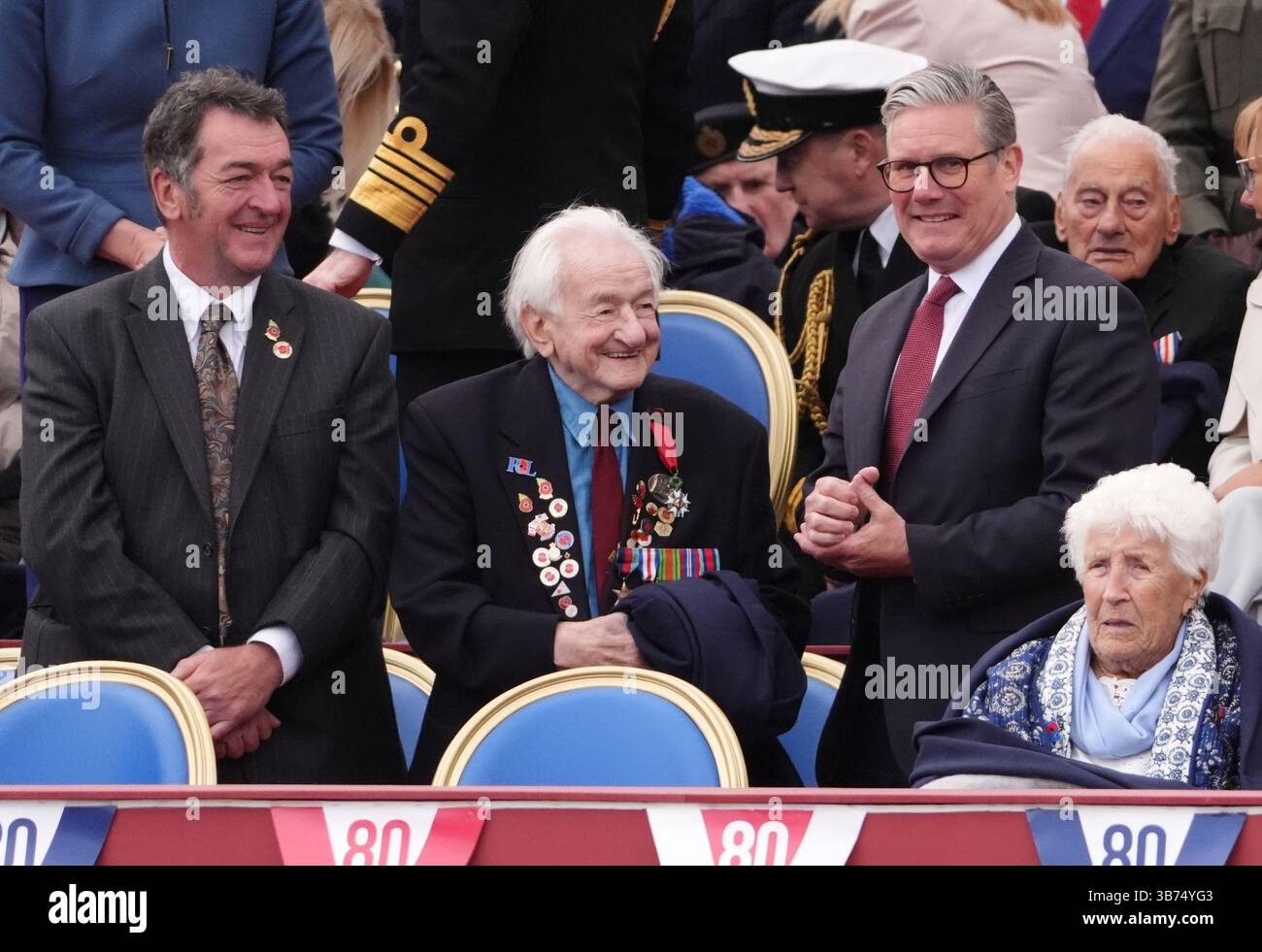Prime Minister Sir Keir Starmer (right) speaks to Second World War ...
