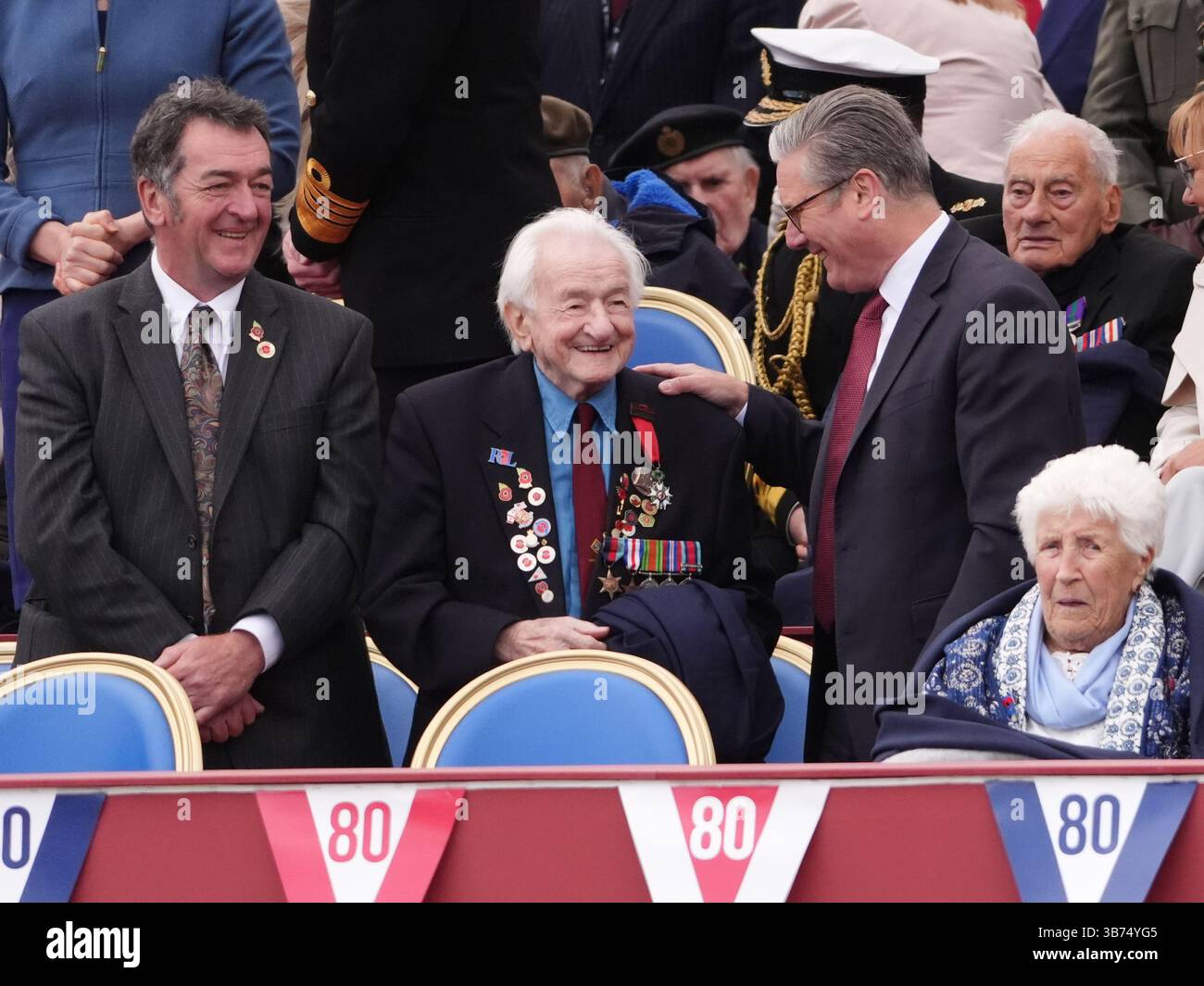 Prime Minister Sir Keir Starmer (right) speaks to Second World War ...