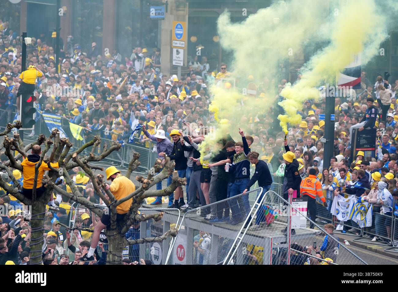 Leeds United fans lining the parade route in the city centre before the ...