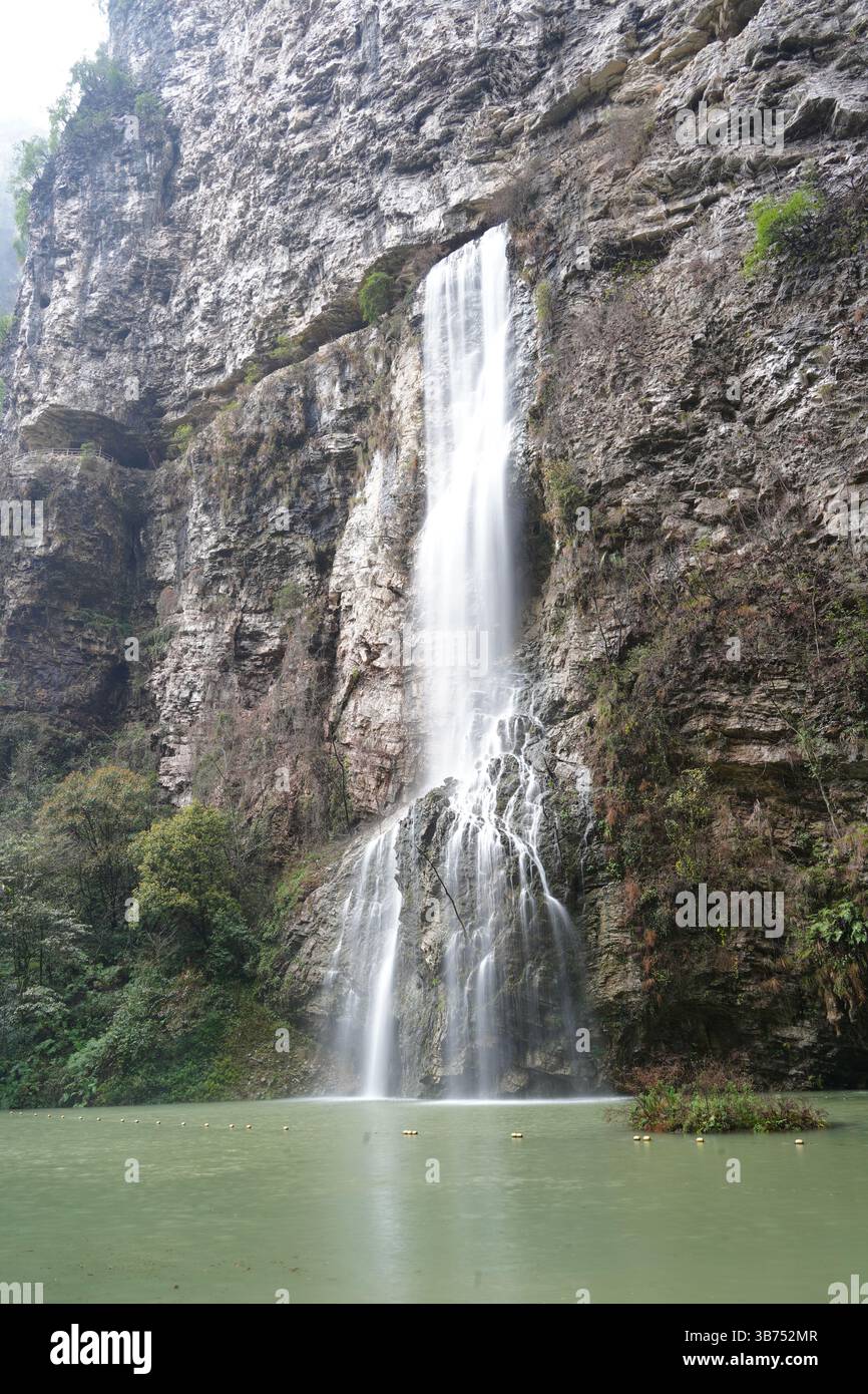 Majestic Waterfall Cascading Down a Rugged Cliff Face Stock Photo - Alamy