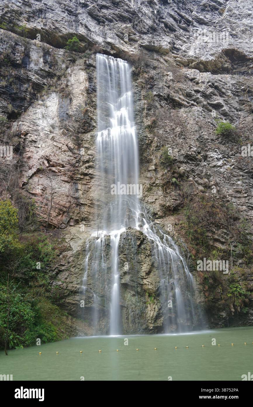 Majestic Waterfall Cascading Down a Rugged Cliff Face Stock Photo - Alamy