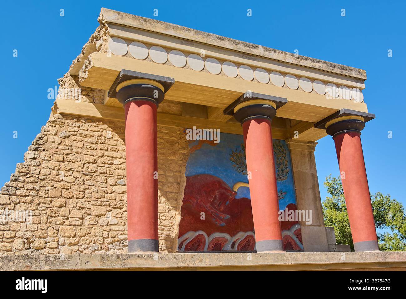 Historic pathways lead visitors through the ruins of Knossos Palace ...