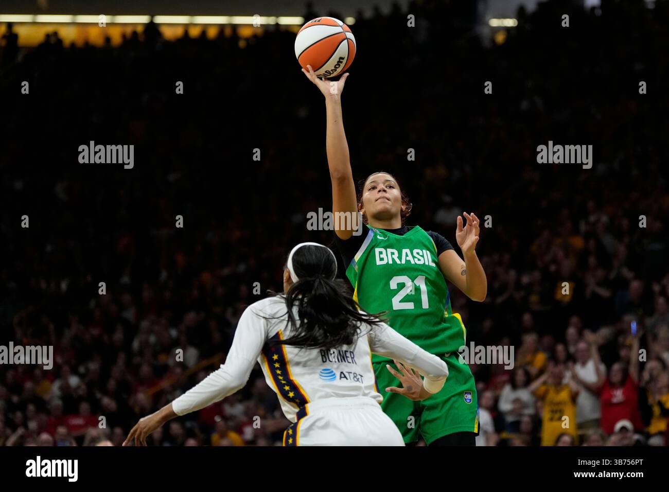 Brazil forward Manuella Alves (21) shoots over Indiana Fever forward DeWanna Bonner during the ...
