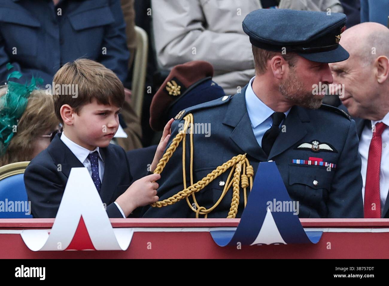 Prince Louis with the Prince of Wales attending the armed forces and ...