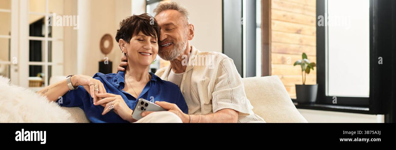 A middle aged couple enjoys quality time together, sharing smiles and ...