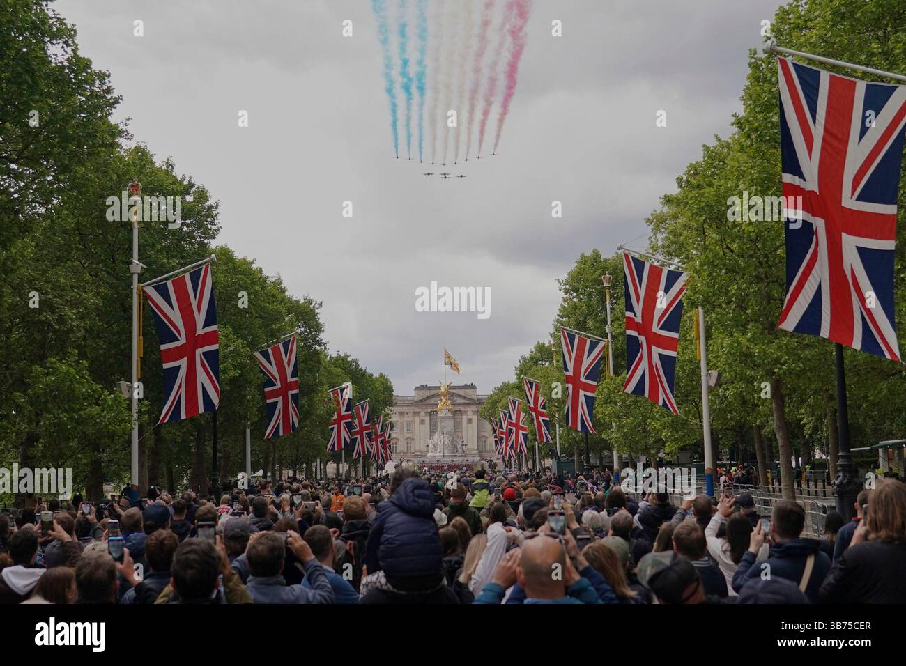 The Red Arrows the Royal Airforce display team, fly over the Mall and ...