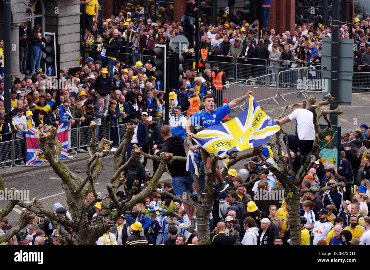 Leeds United fans lining the parade route in the city centre before the ...