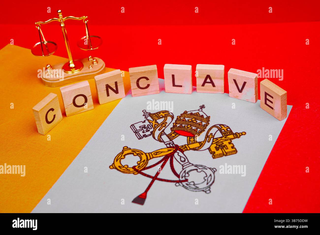 Mini scales and the inscription conclave on the background of the ...