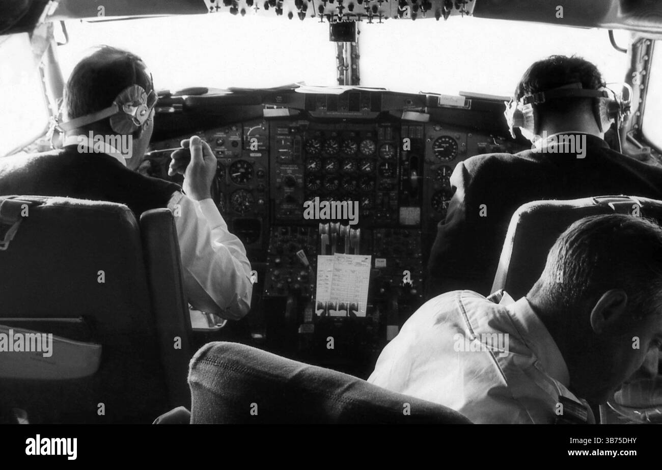 From the days when passengers had access to the pilot - BOAC crew - pilot, co-pilot and ...