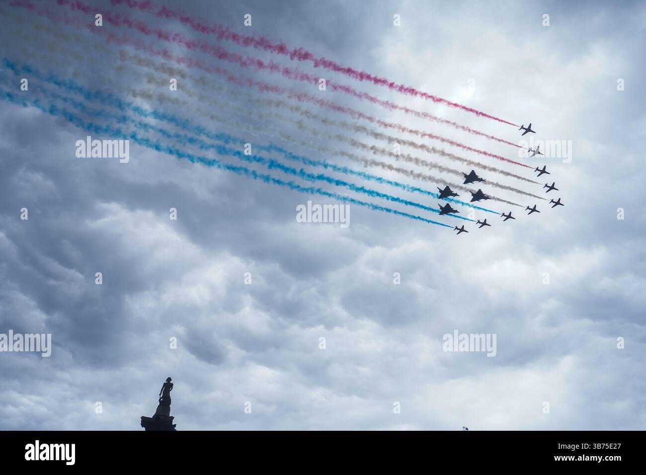 London UK 5 May 2025. Hawk 1 Red Arrows accompanied by RAF Typhoons ...