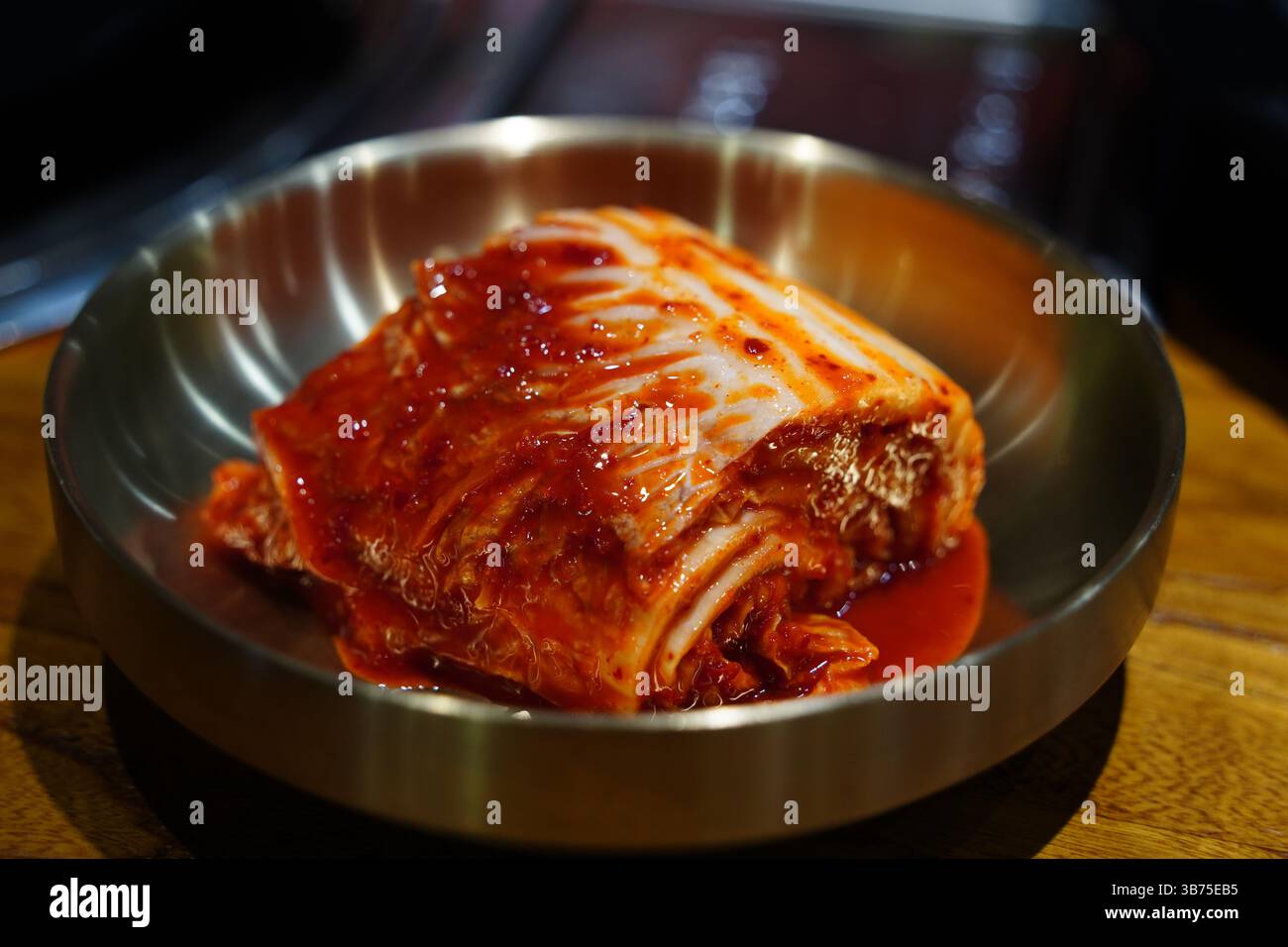 Close-Up of a Delicious Kimchi Dish on a Golden Tray Stock Photo - Alamy
