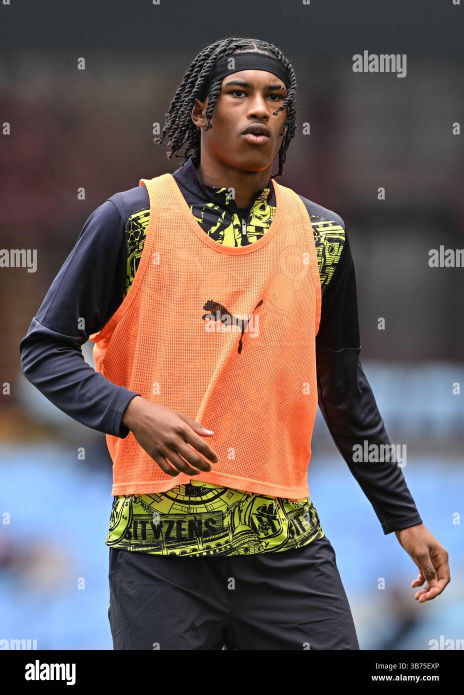 Birmingham, UK. 5th May, 2025. Reigan Heskey of Manchester City warms ...