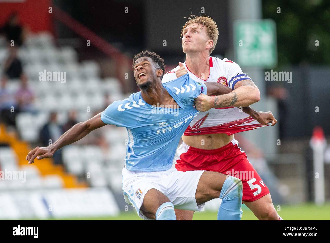 Shirt pulling football hi-res stock photography and images - Alamy