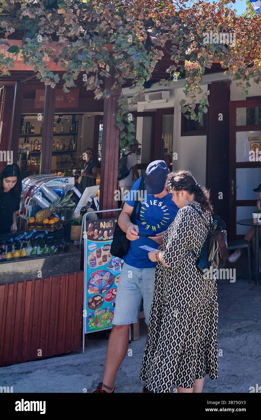 Crete.Greece - may 05, 2025: Fresh juice stand with fruit display ...