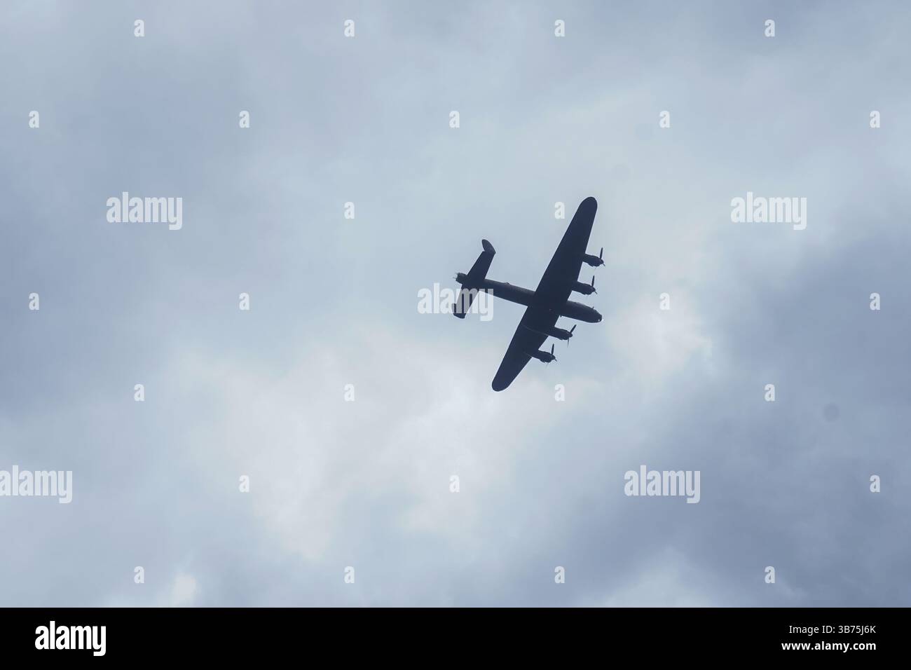 London UK 5 May 2025. A Lancaster bomber performs a flypast over ...