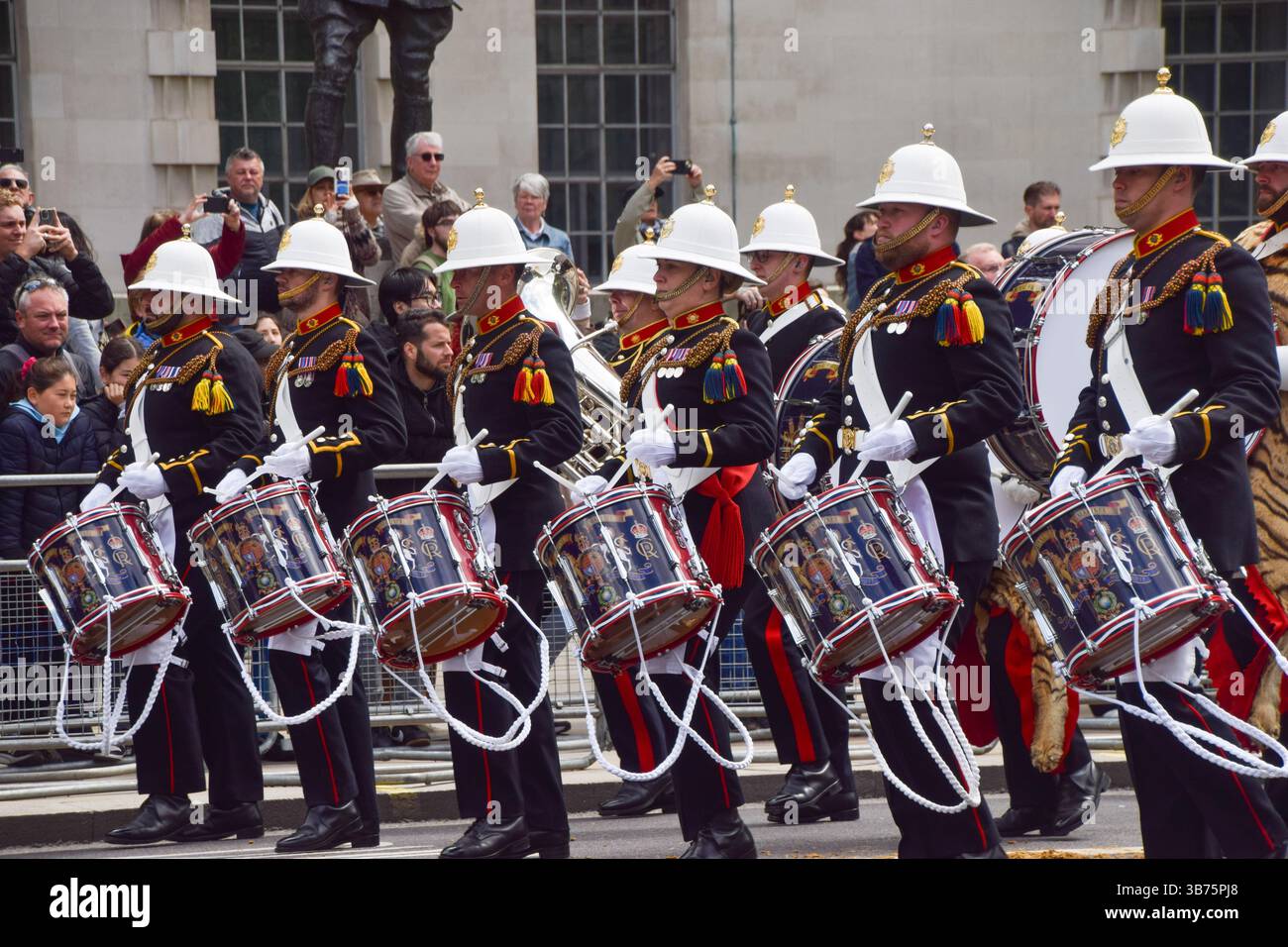 London, UK. 5th May 2025. Members of the military pass through ...