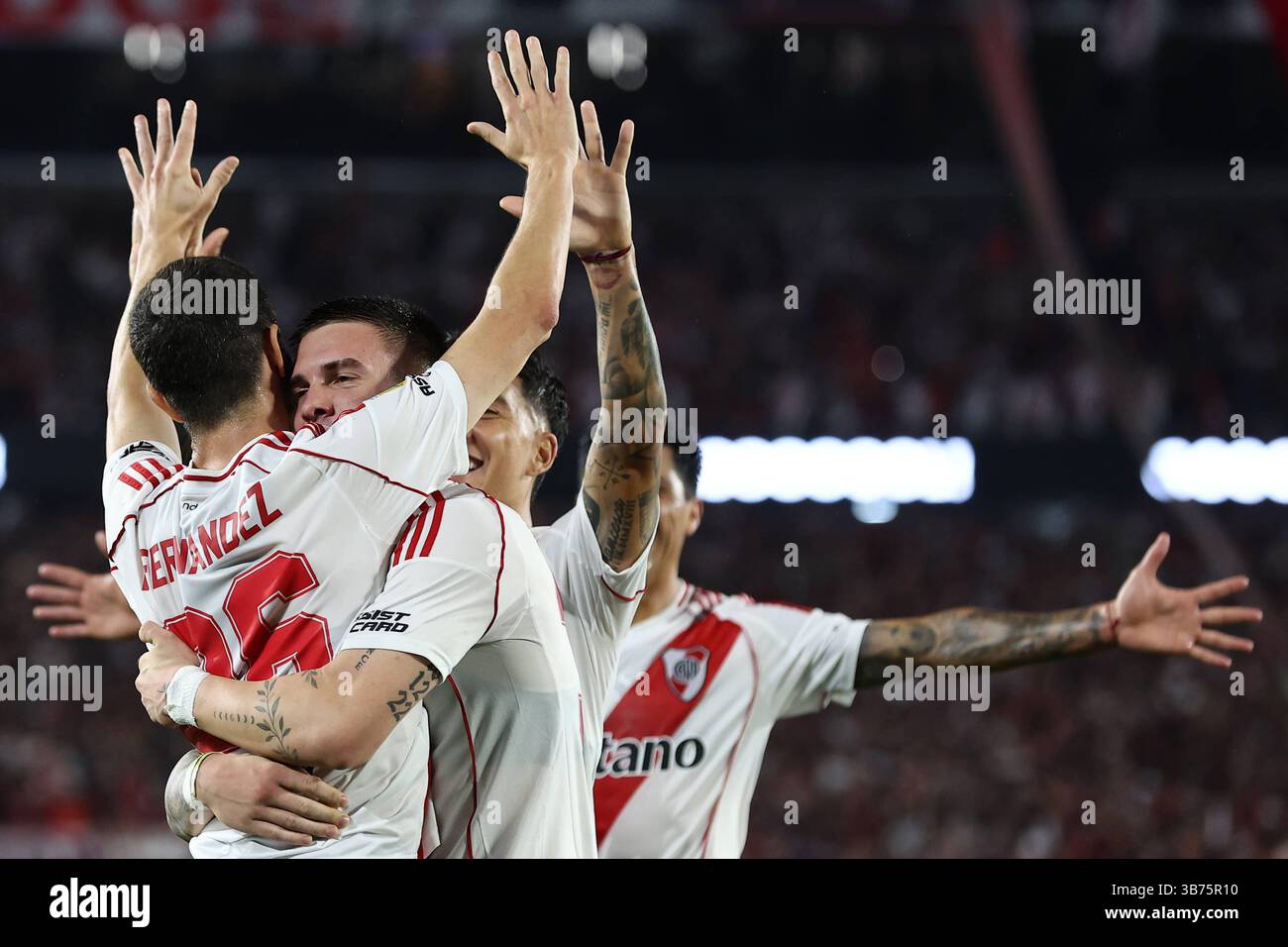 River Plate s midfielder Ignacio Fernandez L celebrates with teammates ...