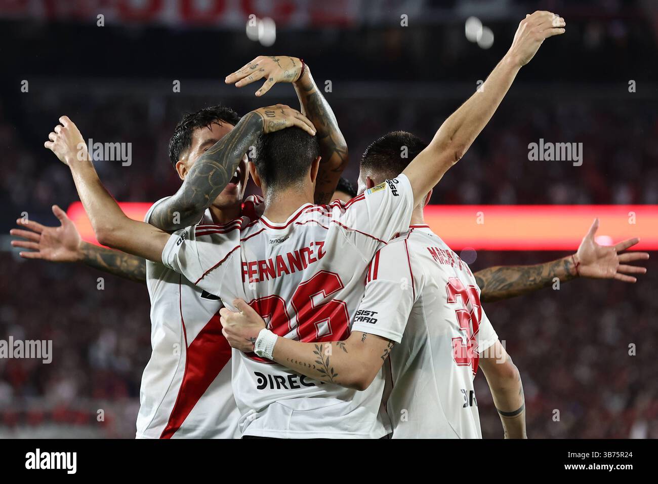 River Plate s midfielder Ignacio Fernandez C celebrates with teammates ...