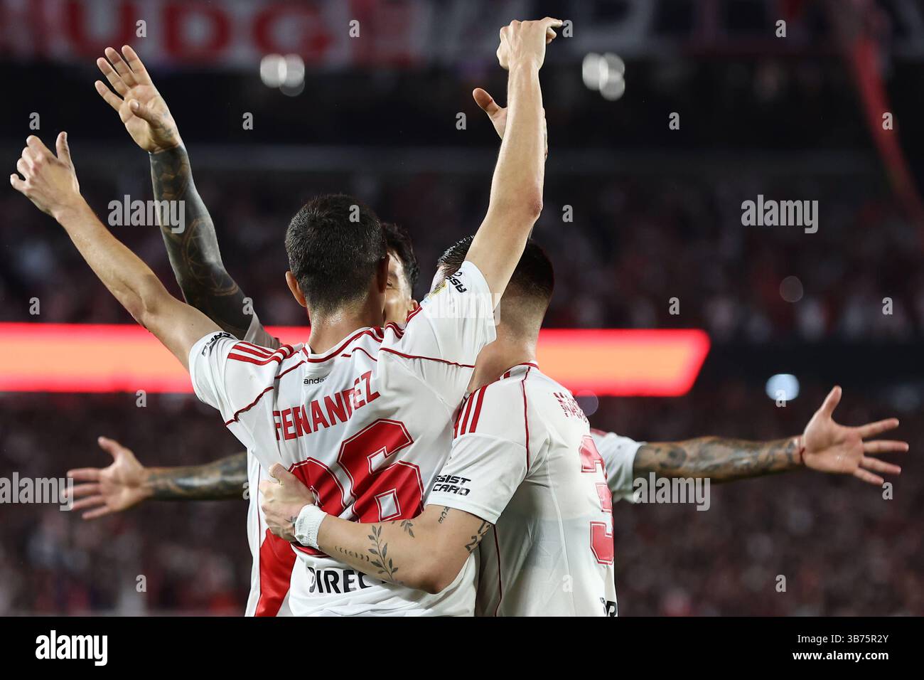 River Plate s midfielder Ignacio Fernandez C celebrates with teammates ...