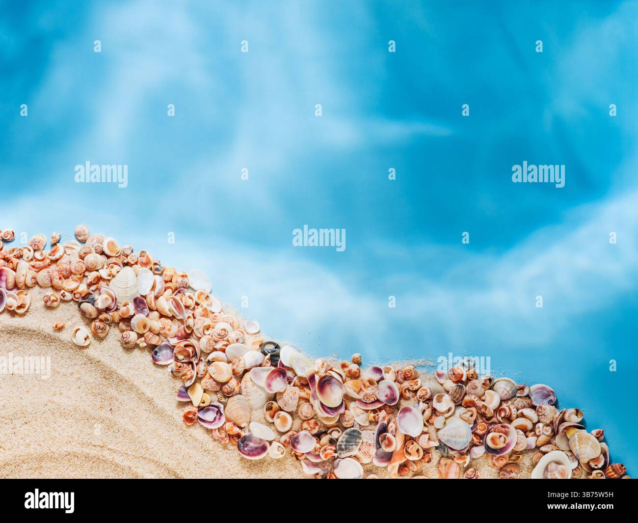 Summer background with sand and seashells on edges and blue background sea water with wave in ...