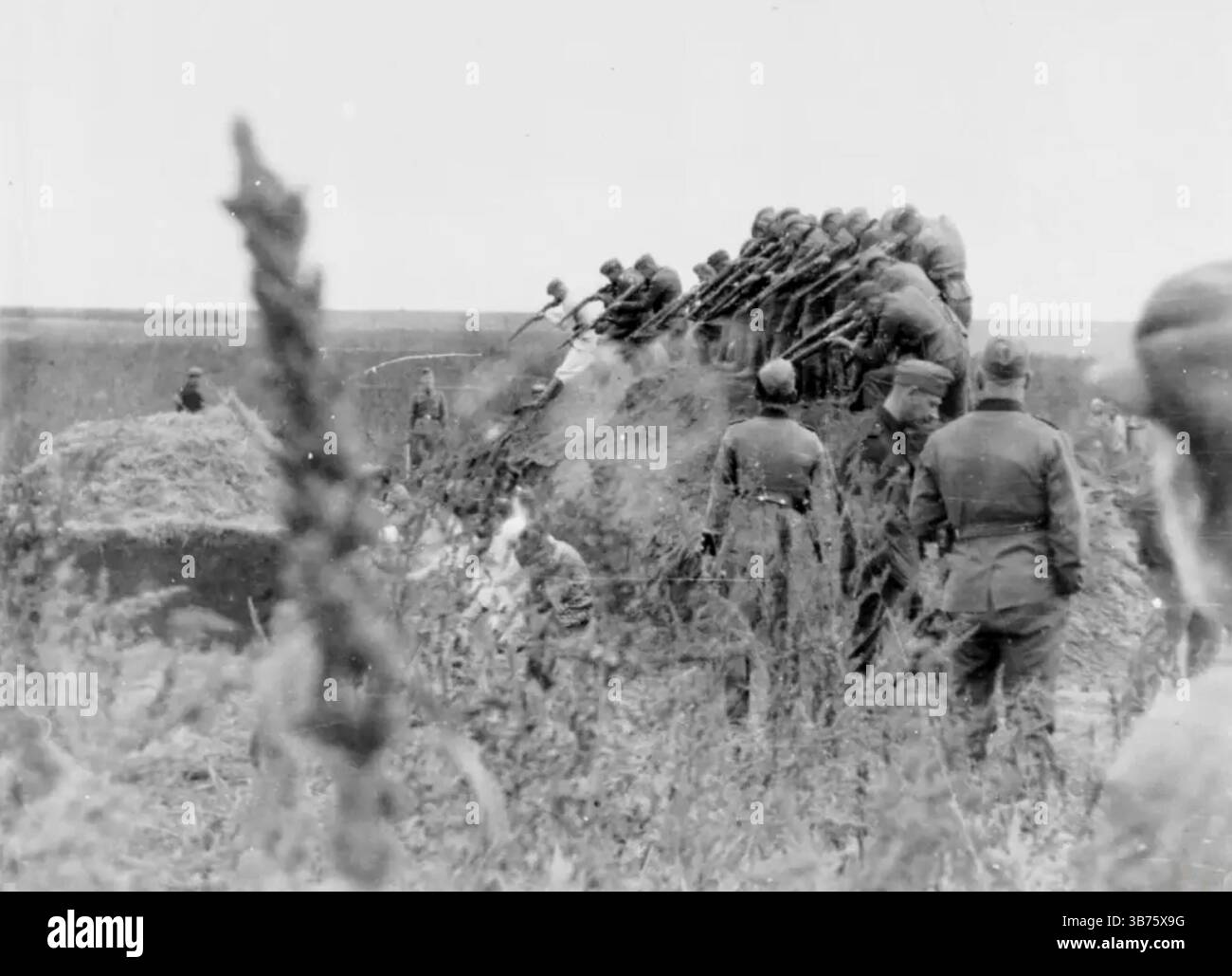 EINSATZGRUPPEN soldiers shooting Jewish women in a pit near Dubossary ...