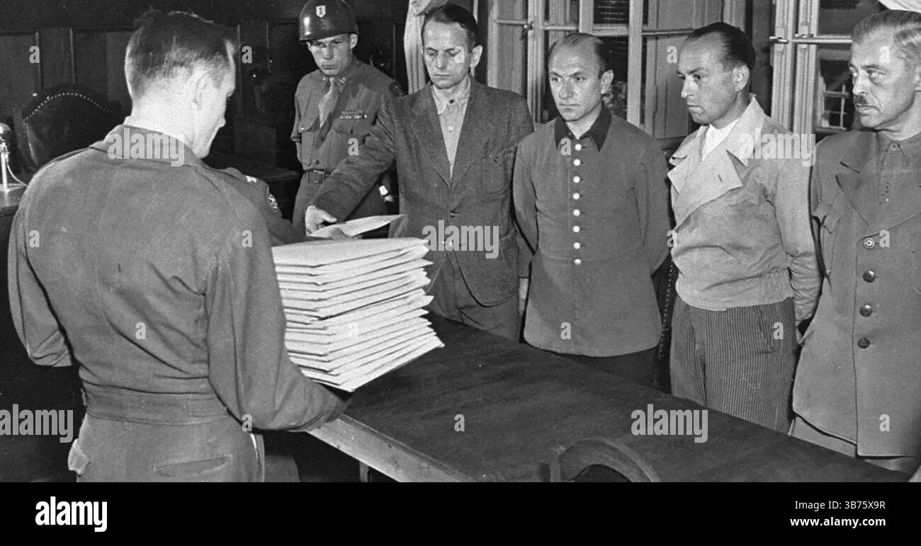 EINSATZGRUPPEN members are handed their indictments at the Nuremberg ...