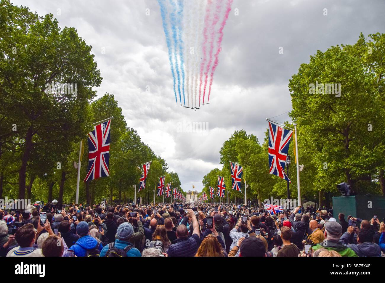 London, England, UK. 5th May, 2025. Red Arrows perform a flypast over ...