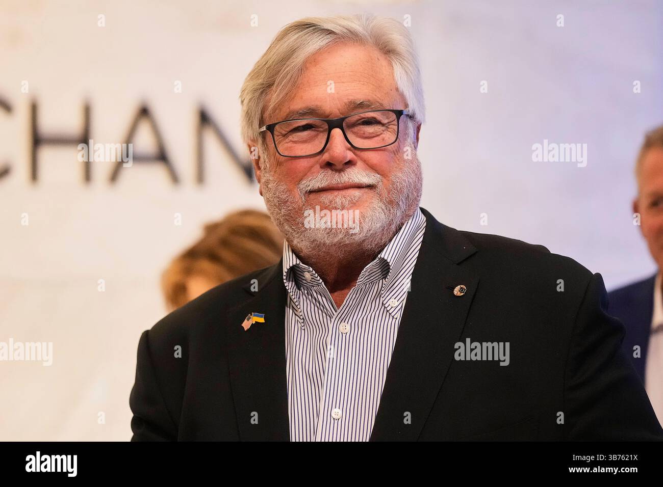 Carnival Corporation Chairman Micky Arison poses for photos on the ...