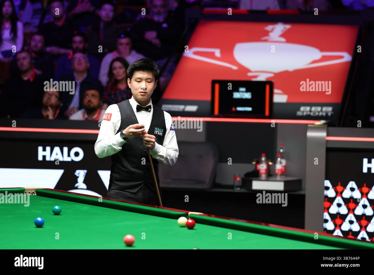 Sheffield, Britain. 5th May, 2025. Zhao Xintong reacts during the final ...