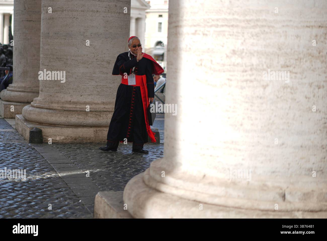 Cardinal William Goh arrives at the Vatican, Monday, May 5, 2025, to ...