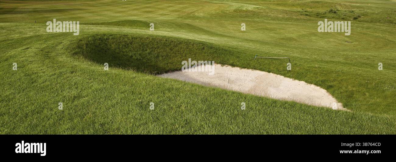 Deep golf bunker on a summer golf course Stock Photo - Alamy