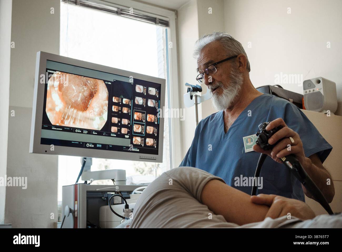 Gastroscopy procedure on sedated patient to examine upper digestive ...