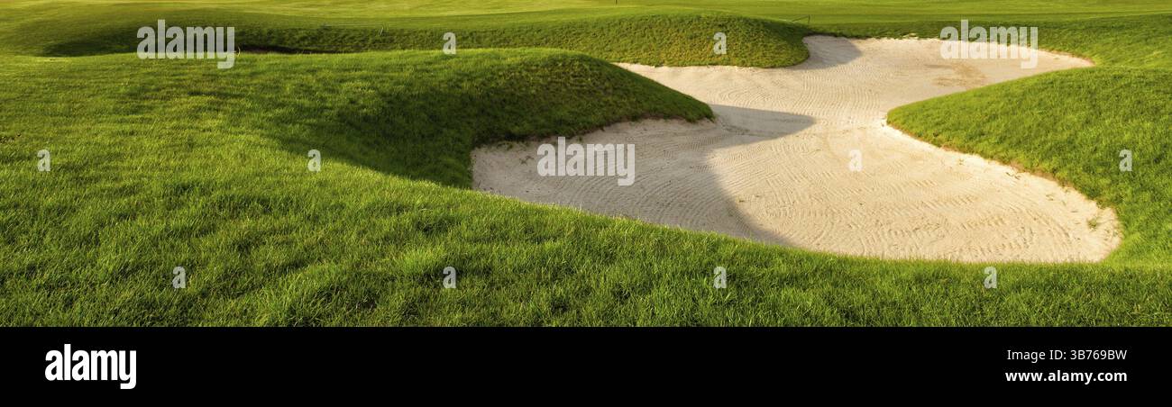 Golf bunker on a summer golf course Stock Photo - Alamy