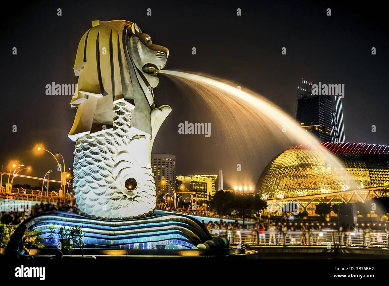 Merlion and Singapore town. Shooting Location: Singapore Stock Photo ...