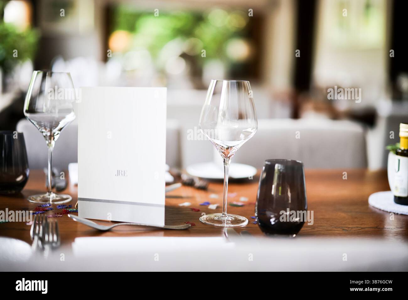 Velbert, Germany. 05th May, 2025. Glasses and a menu are laid out on a ...