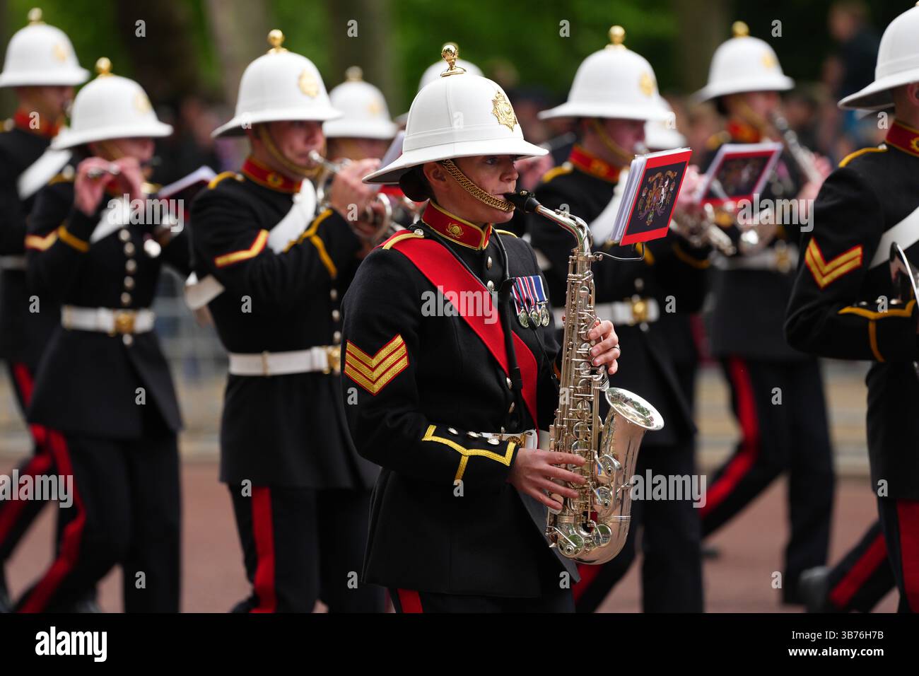 The Band of His Majesty’s Royal Marines parade on The Mall during a ...