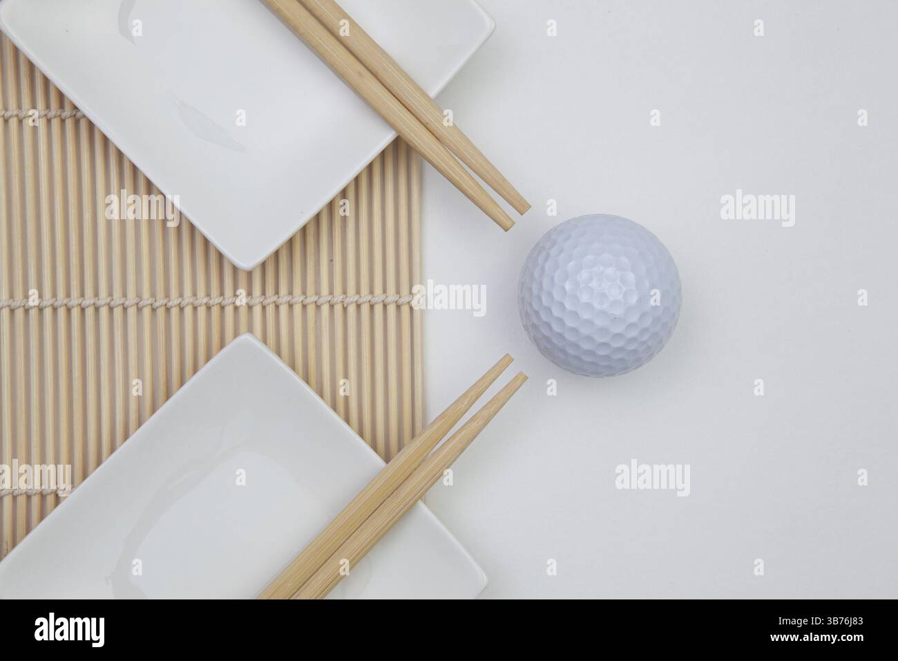Top View Of White Empty Sushi Plates With Bamboo Chopsticks and Golf ...