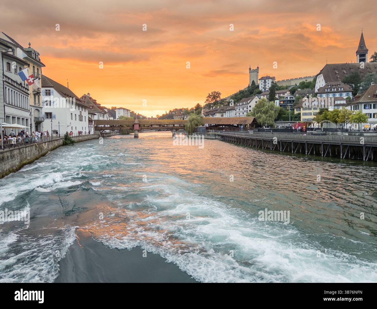 Beautiful sunset in the historic medieval town of Lucerne along the ...