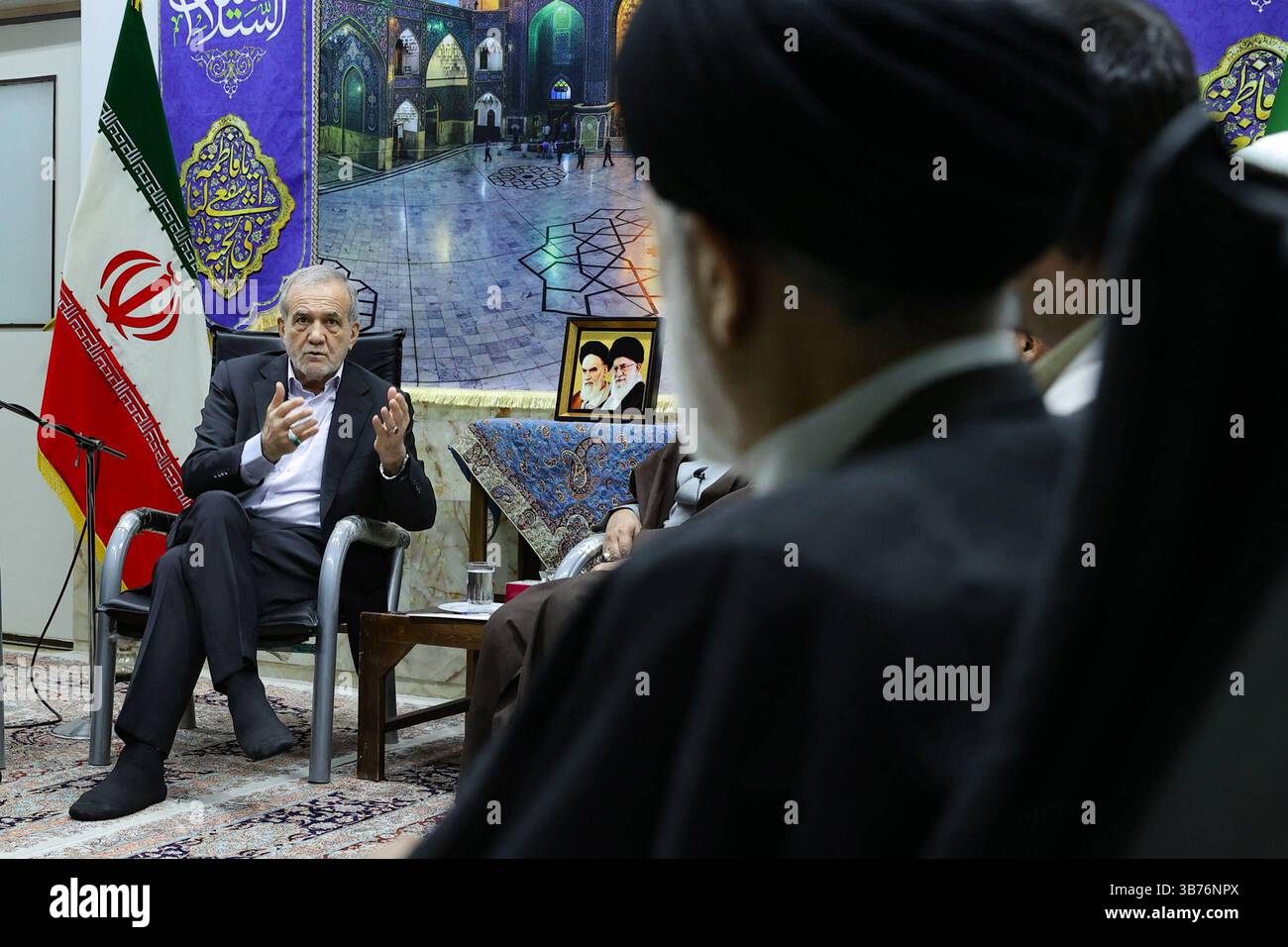 Iranian President Masoud Pezekshian visits the city of Qom, south of ...