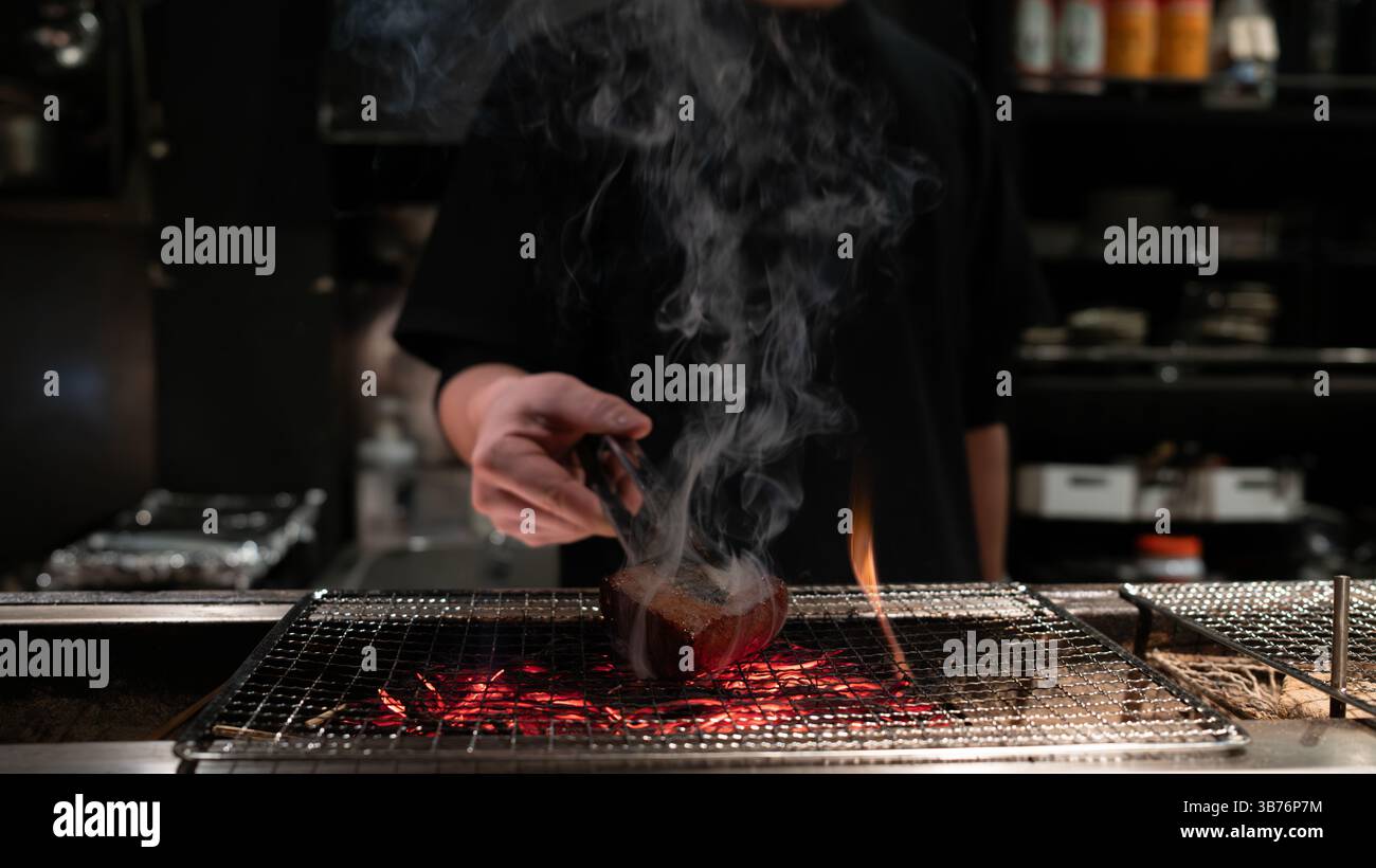 deep grilled the japanese Wagyu in kitchen at Japan Stock Photo - Alamy