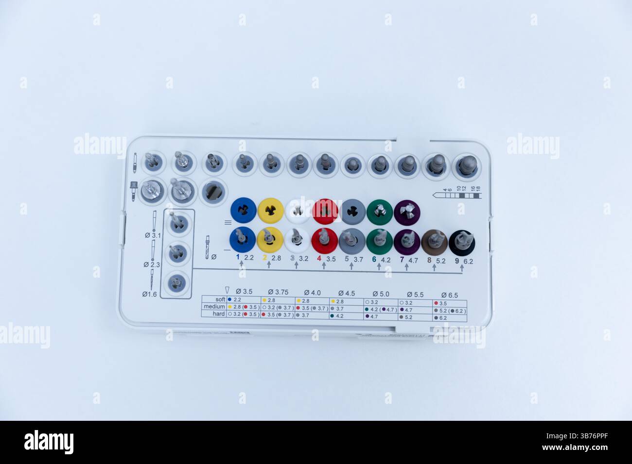 This image showcases a well-arranged dental drill bit set featuring ...